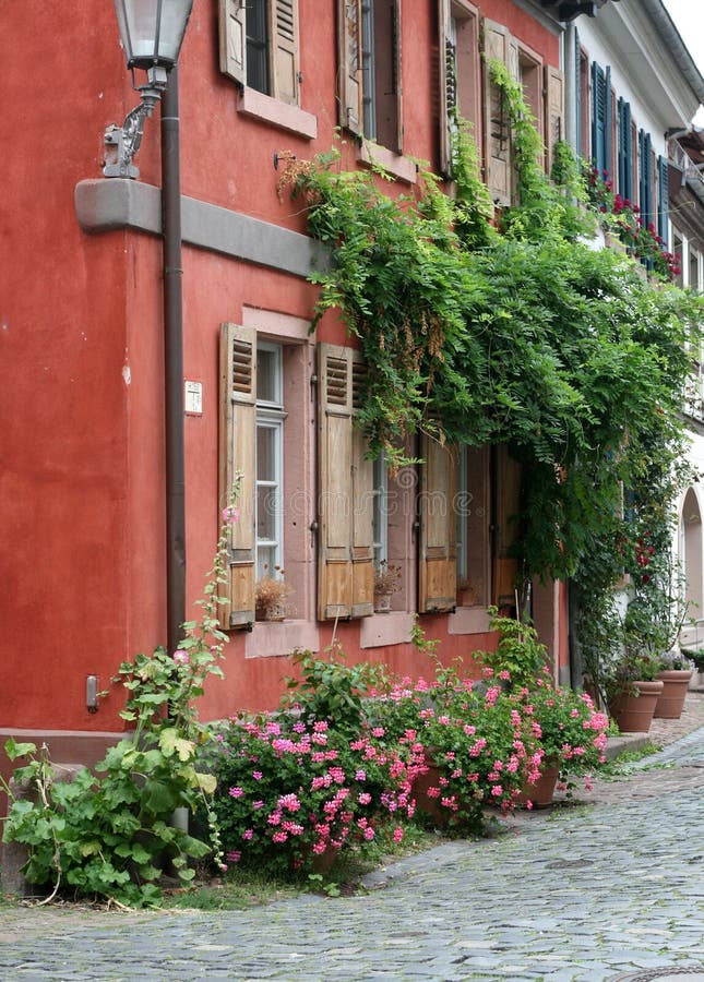 Old House Facade with Flowers. Stock Photo - Image of southern, village ...
