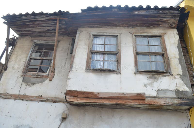 Old House Made of Wood and Stone with Broken Windows Stock Image ...