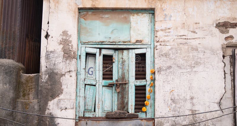 Old House in Mumbai, India, Aged Rustic Facade with Broken Blue Colored ...