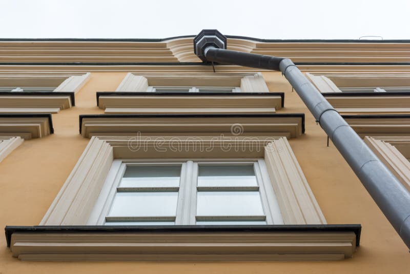 Old House with a New Facade and Gutter Stock Image - Image of drain ...