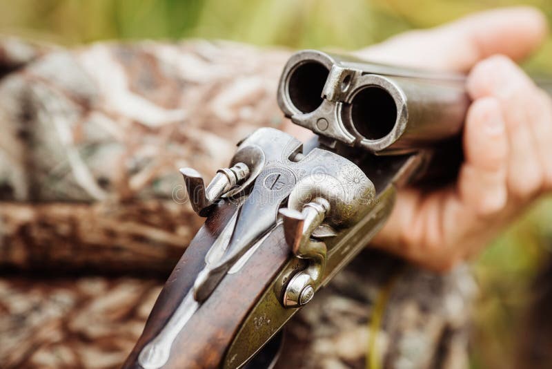 Hunter loading rifle stock photo. Image of hunting, shells - 35703286