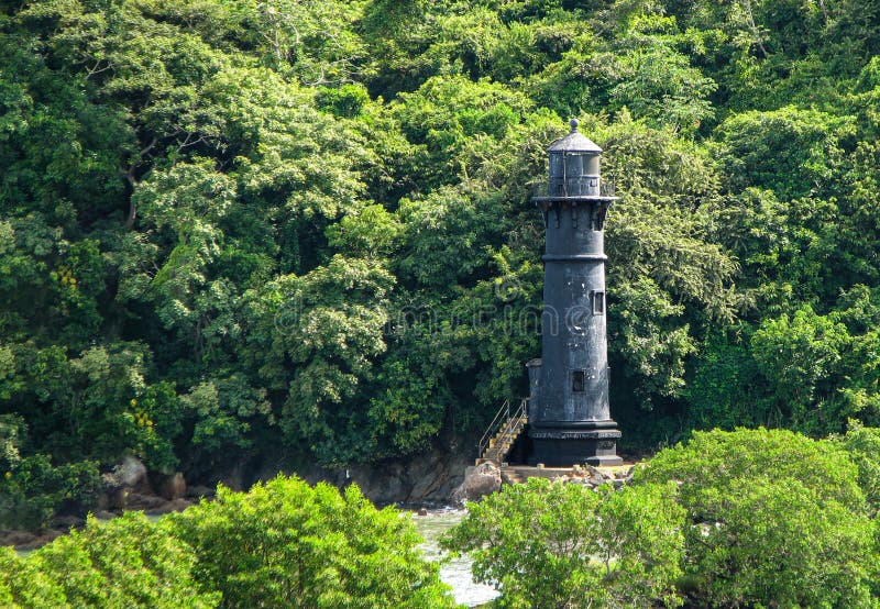 An Old, Inactive Black Lighthouse in the Panama Canal Stock Photo ...