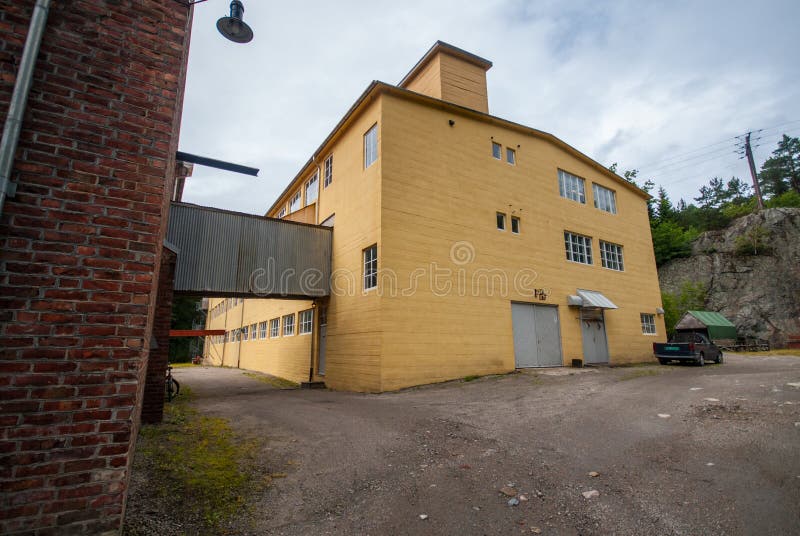 Old Industrial Building with Yellow Facade and Bridge.. Stock Image ...