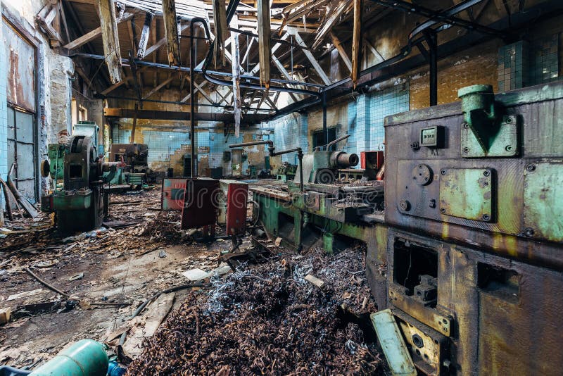 Old Industrial Machine Tools in Workshop. Rusty Metal Equipment in ...