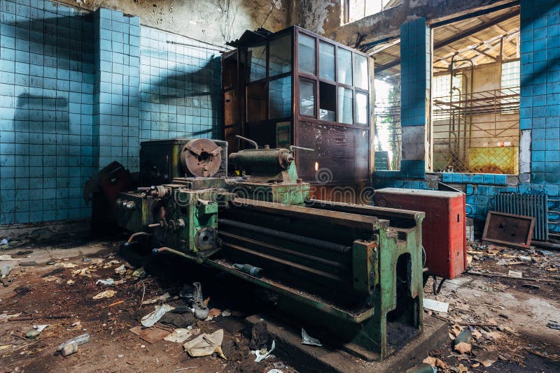 Old Industrial Machine Tools and Rusty Metal Equipment in Abandoned ...
