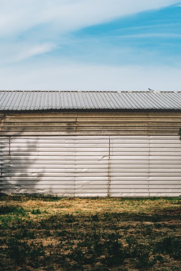 Old Industrial Warehouse with Facade Made of Corrugated Metal Sheets ...