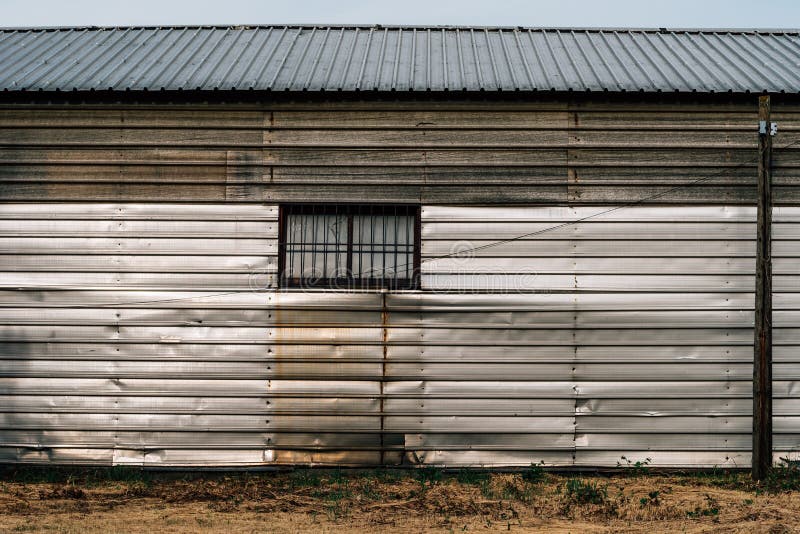 Old Industrial Warehouse with Facade Made of Corrugated Metal Sheets ...