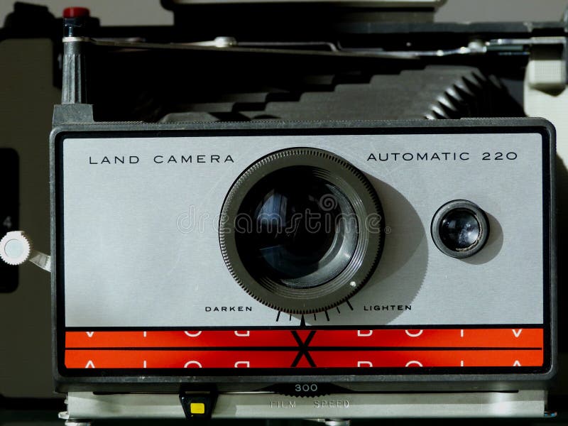 Old Instant Camera Frontal Close-up View with Red and Silver Face Plate ...