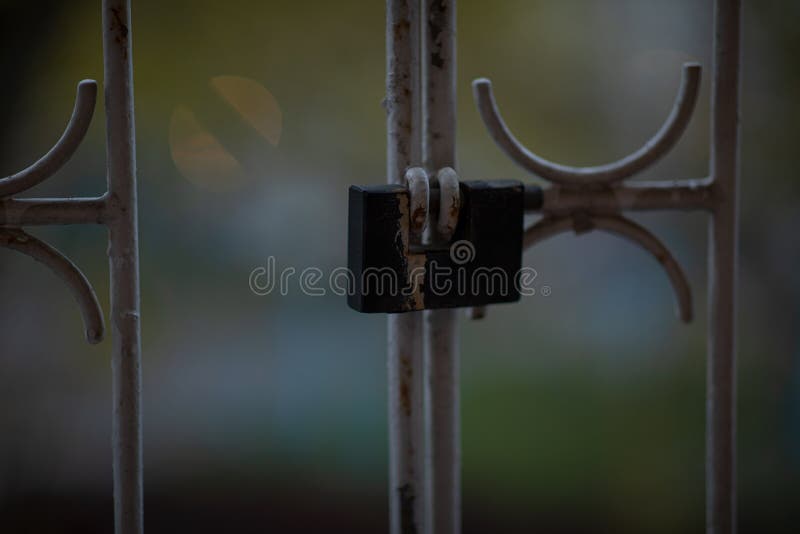 Old Iron Bars with a Lock Protect the Windows Stock Photo - Image of ...