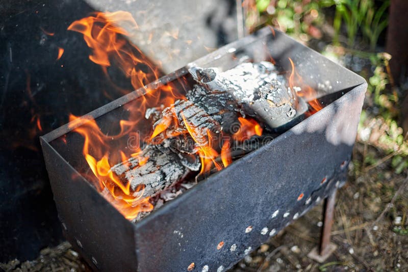 An Old Iron Brazier with Burning Wood Stock Image - Image of warmth ...