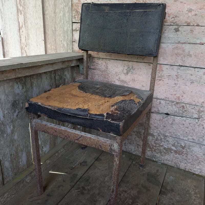 An Old Iron Chair with a Broken Spong Seat Stock Photo - Image of ...