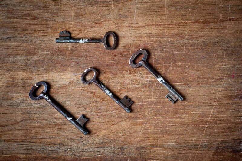 Old Iron Door Keys Lying on an Old Wooden Surface Stock Photo - Image ...