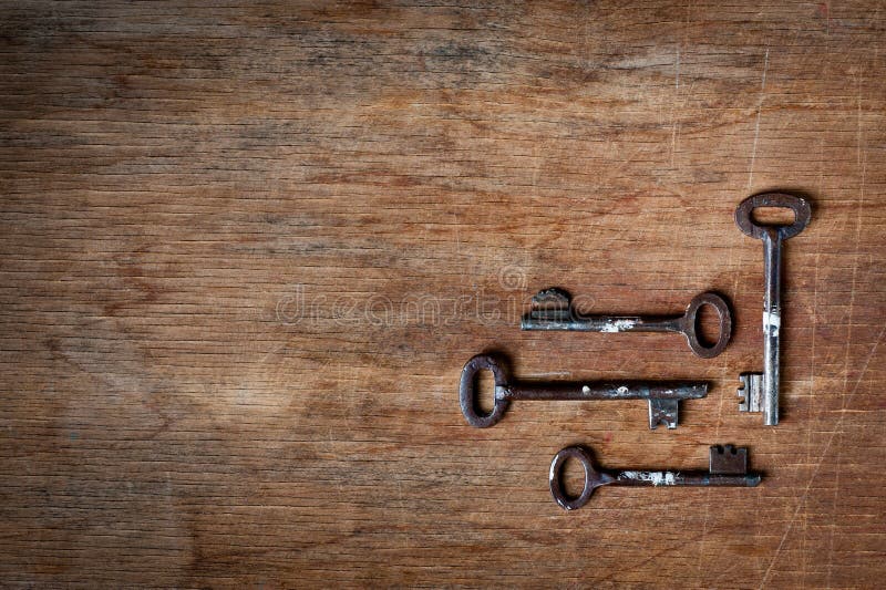Old Iron Door Keys Lying on an Old Wooden Surface Stock Photo - Image ...