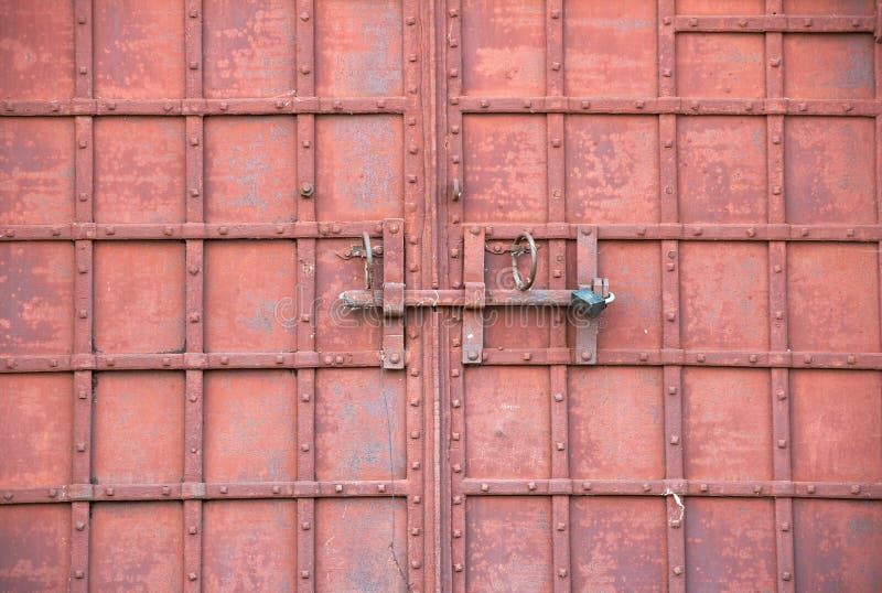 Old iron gate on the bolt stock photo. Image of warehouse - 54200646