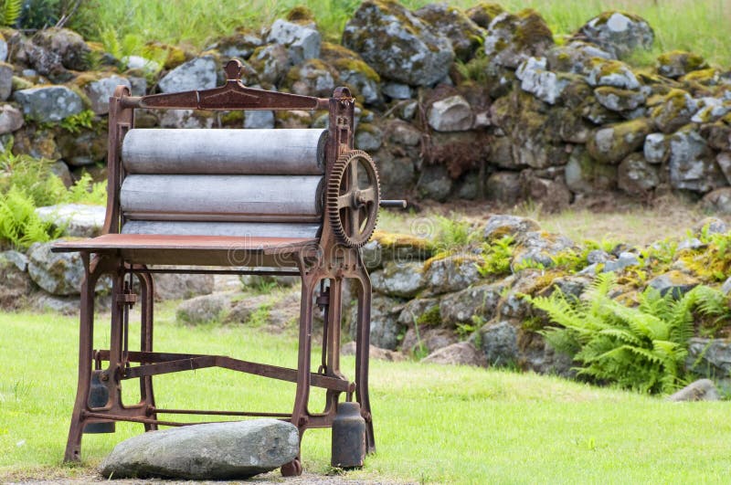 An old iron laundry mangle stock image. Image of machinery - 20777193