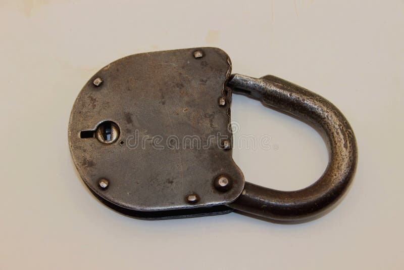 An old iron lock. Macro. stock photo. Image of surface - 254690790