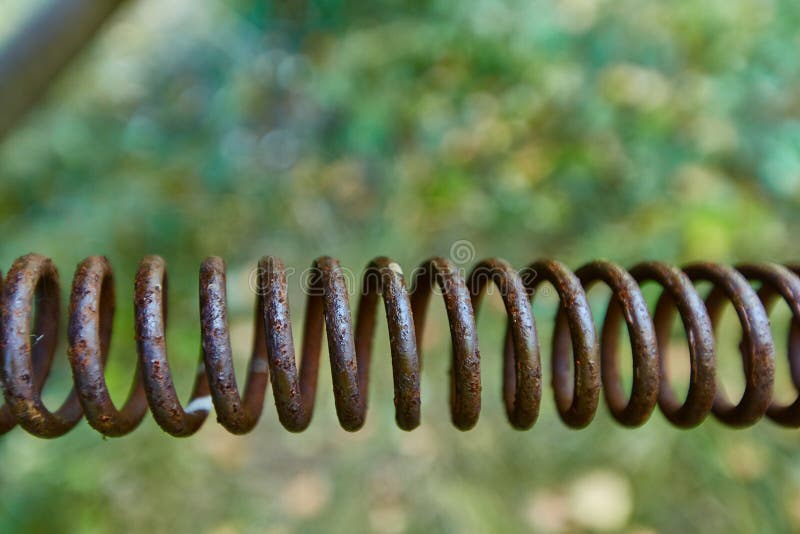 Old Iron Metal Tractor Spring Stock Photo - Image of round, metal ...