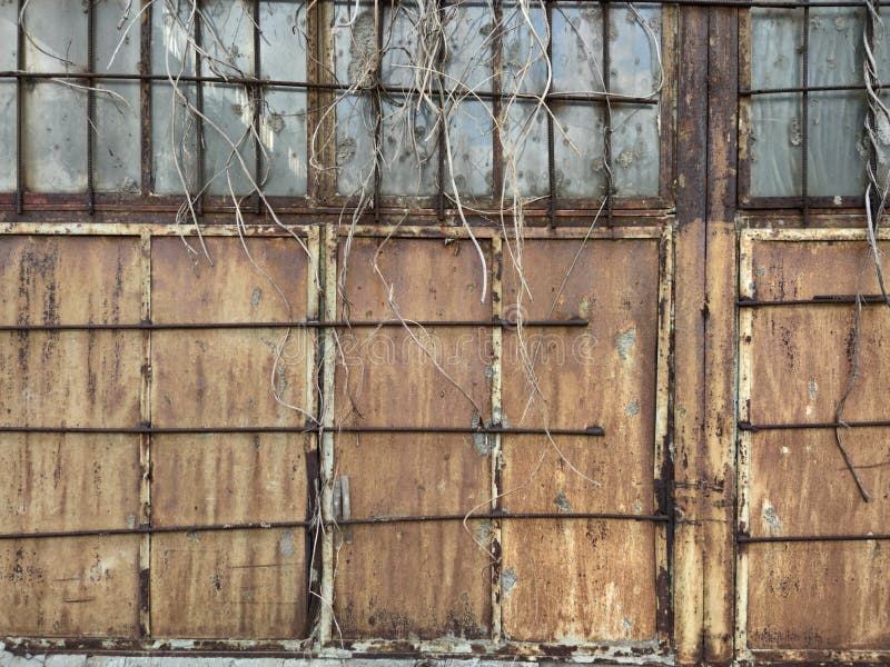 Old Iron Rusty Gate with Glass Windows Stock Photo - Image of gate ...
