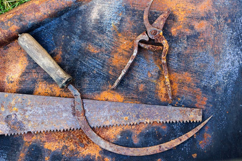 Rusty Tools on the Rusty Sheet Stock Photo - Image of secater, hook ...
