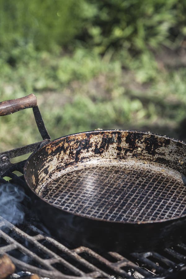 Old Iron Skillet on the Fire. Brazier. Field Cooking Stock Photo ...
