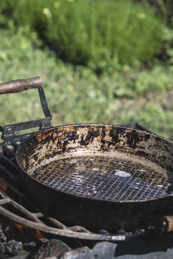 Old Iron Skillet on the Fire. Brazier. Field Cooking Stock Image ...