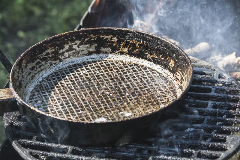 Old Iron Skillet on the Fire. Brazier. Field Cooking Stock Image ...