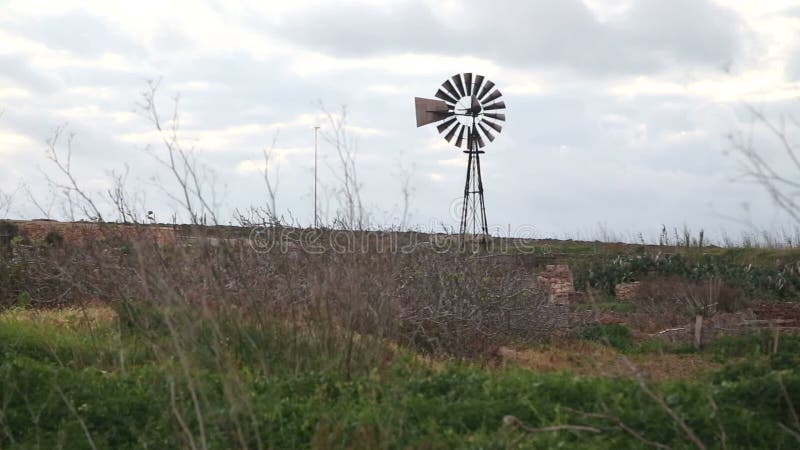 Old Iron Windpump Windmill Spinning in Nature Stock Video - Video of ...