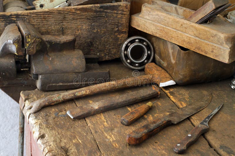 Old Iron Work Tools on the Workbench in the Garage. Stock Image - Image ...