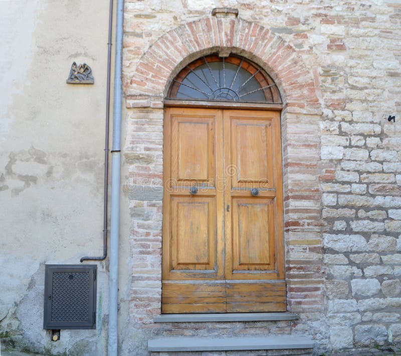 Old italian front door stock image. Image of brown, italian - 70089133
