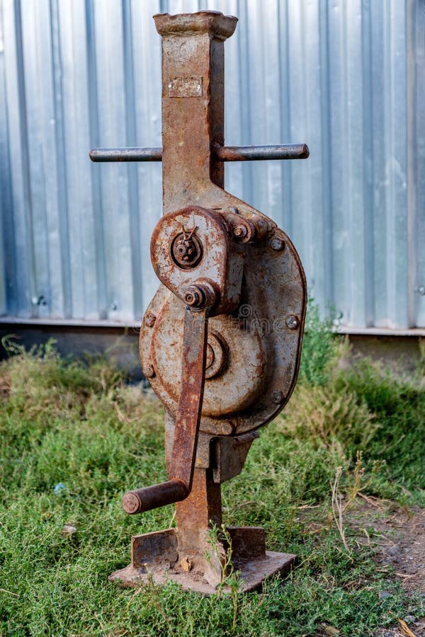 House Lifting Jack. Old Rusty Mechanical Jack Stock Photo - Image of ...
