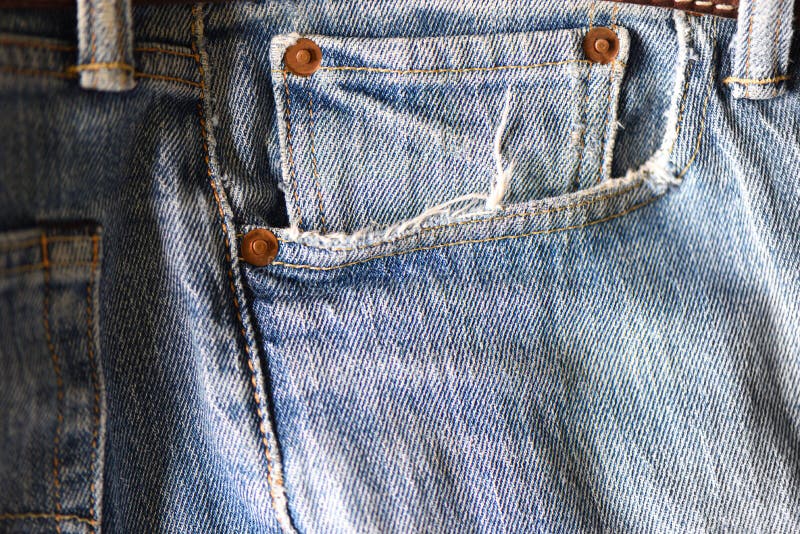 Old Jeans. Tousled Thread on the Pocket of Jeans. Shabby Stuff Stock ...