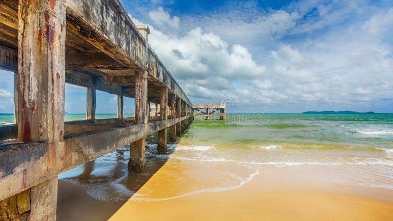 Old jetty at clean beach stock image. Image of view, dock - 90226985