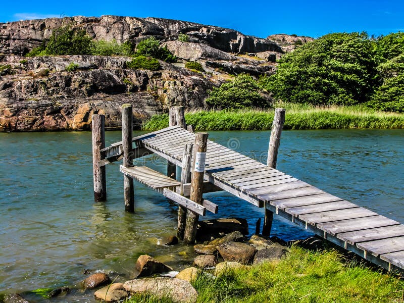 Old jetty in Sweden stock photo. Image of rocks, european - 43719064