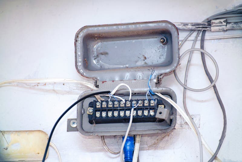 An Old Junction Box with Wires on a Light Wall Stock Image - Image of ...
