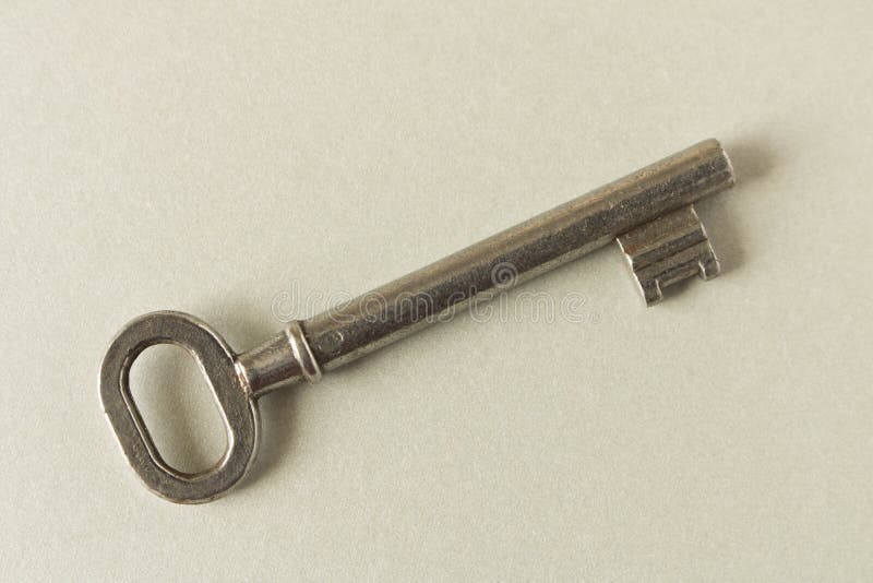 Old Key on Grey Background. Key Isolated on Grey Background Stock Photo ...