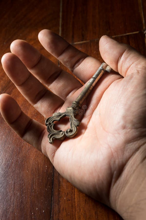Old key in hand. stock image. Image of solution, security - 49060805