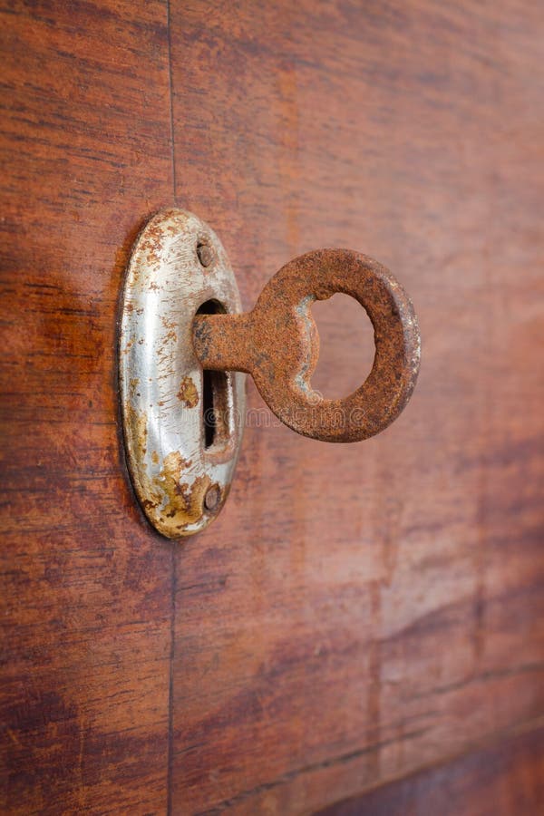 Old key in a keyhole stock image. Image of closet, security - 24427889