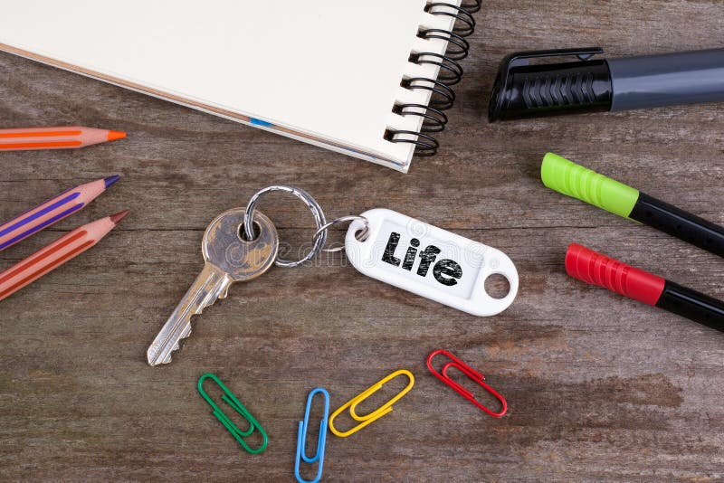 Old Key with Life Text. Wooden Texture Background with Pencils, Stock ...