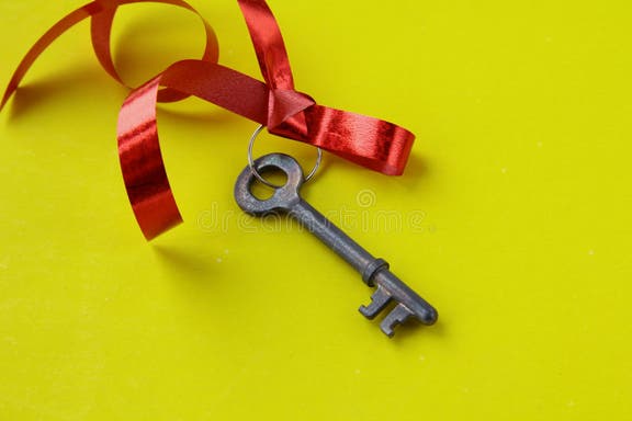Old key with a red ribbon stock photo. Image of white - 18003312
