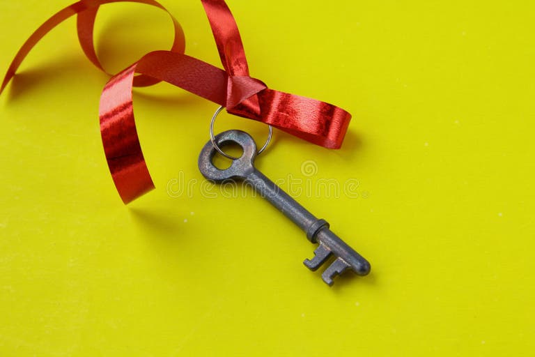 Old key with a red ribbon stock photo. Image of white - 18003312