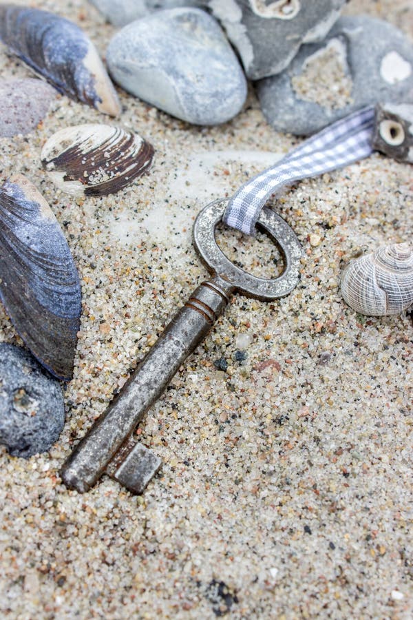 Old Key stock image. Image of sandy, blue, sand, shells - 57241561