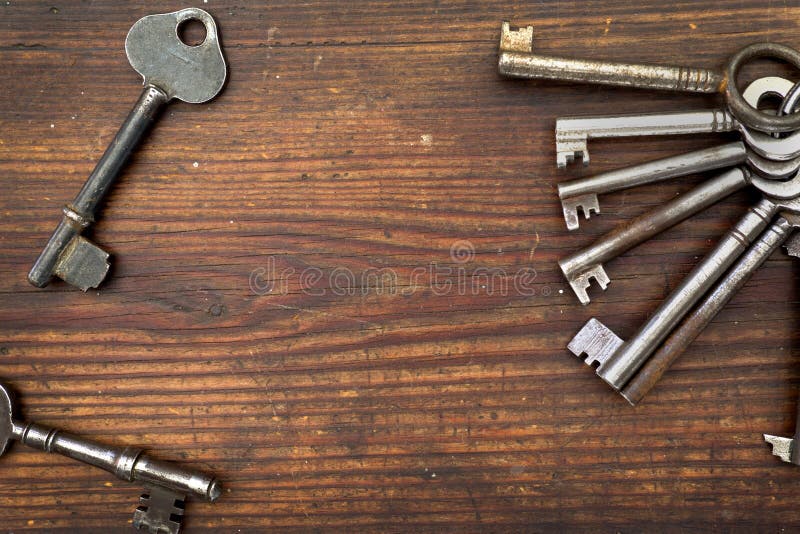 Old keys arranged on wood stock image. Image of retro - 99366263