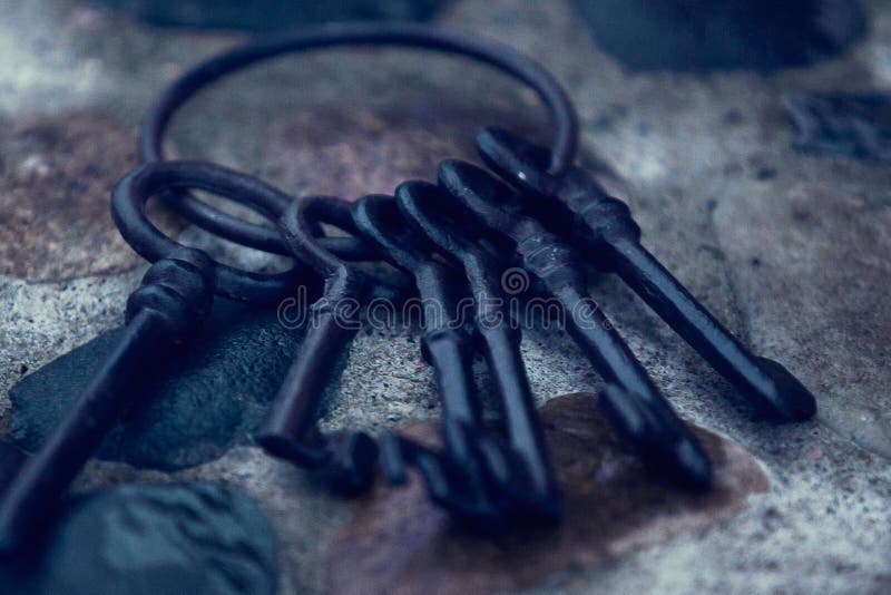 Old Keys on the Dark Stone. Bunch of Ancient Keys Stock Image - Image ...