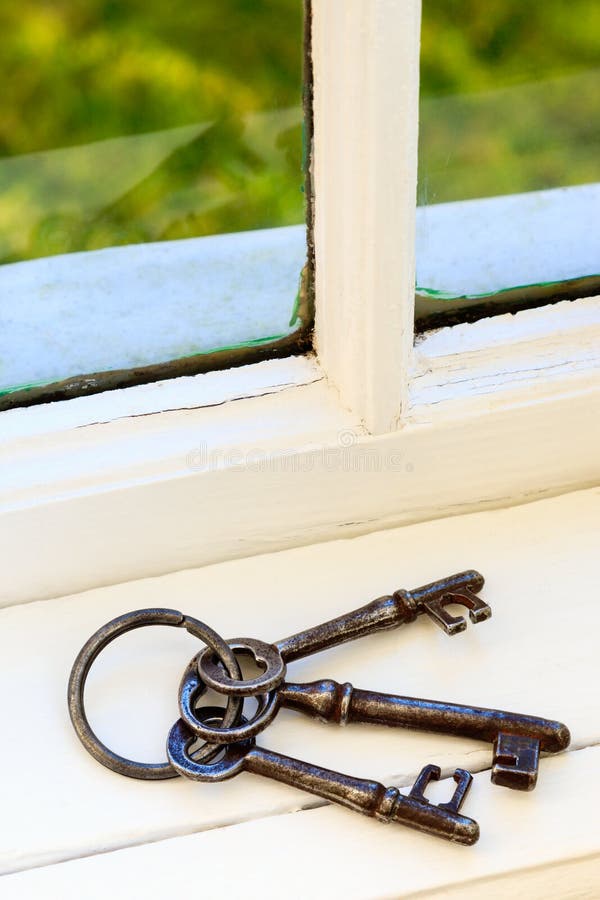 Old Keys on Windowsill by Window Stock Photo - Image of metal, symbol ...
