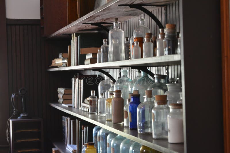Old Lab and Bottles on a Shelf Stock Photo - Image of night, stormy ...