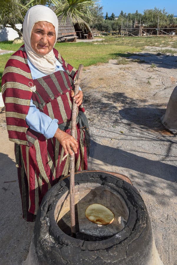 Old Lady Baking a Traditional Arab Bread at Sousse in Tunisia Editorial ...