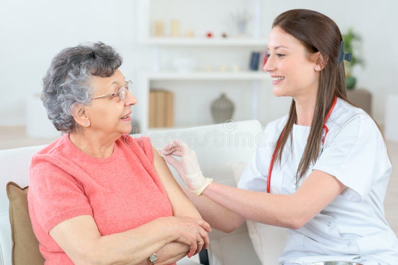 Old Lady Getting Injection at Home Stock Image - Image of office, coat ...