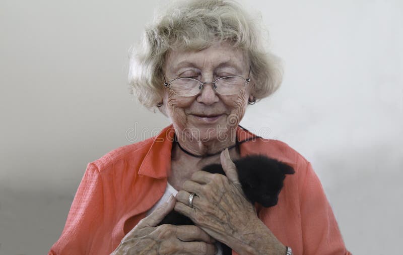 Old Lady and Her Beloved Kitty Stock Image - Image of holding, kitten ...