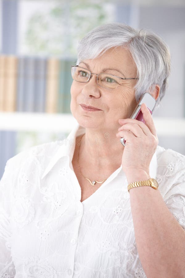 Old lady on mobile phone stock image. Image of cell, looking - 28432511