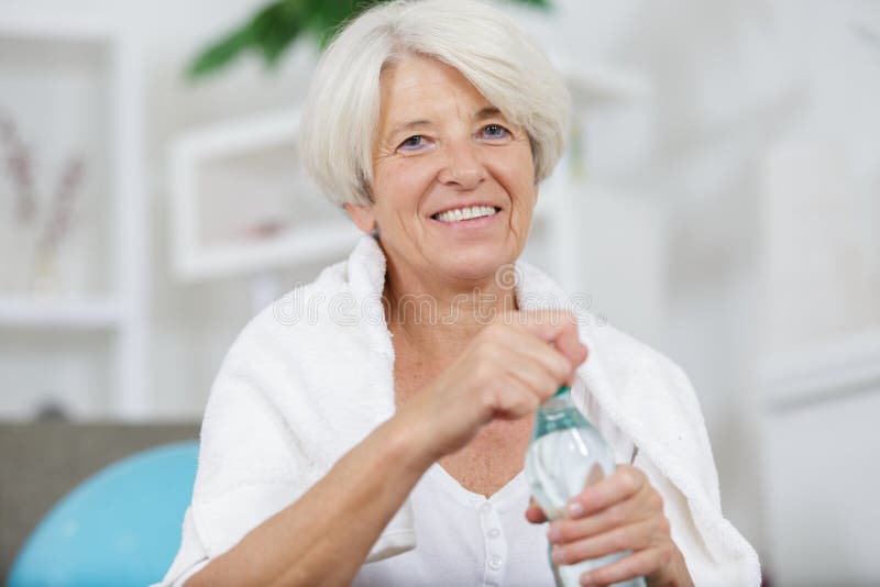 Old Lady Resting after Workout Stock Photo - Image of casual, indoor ...